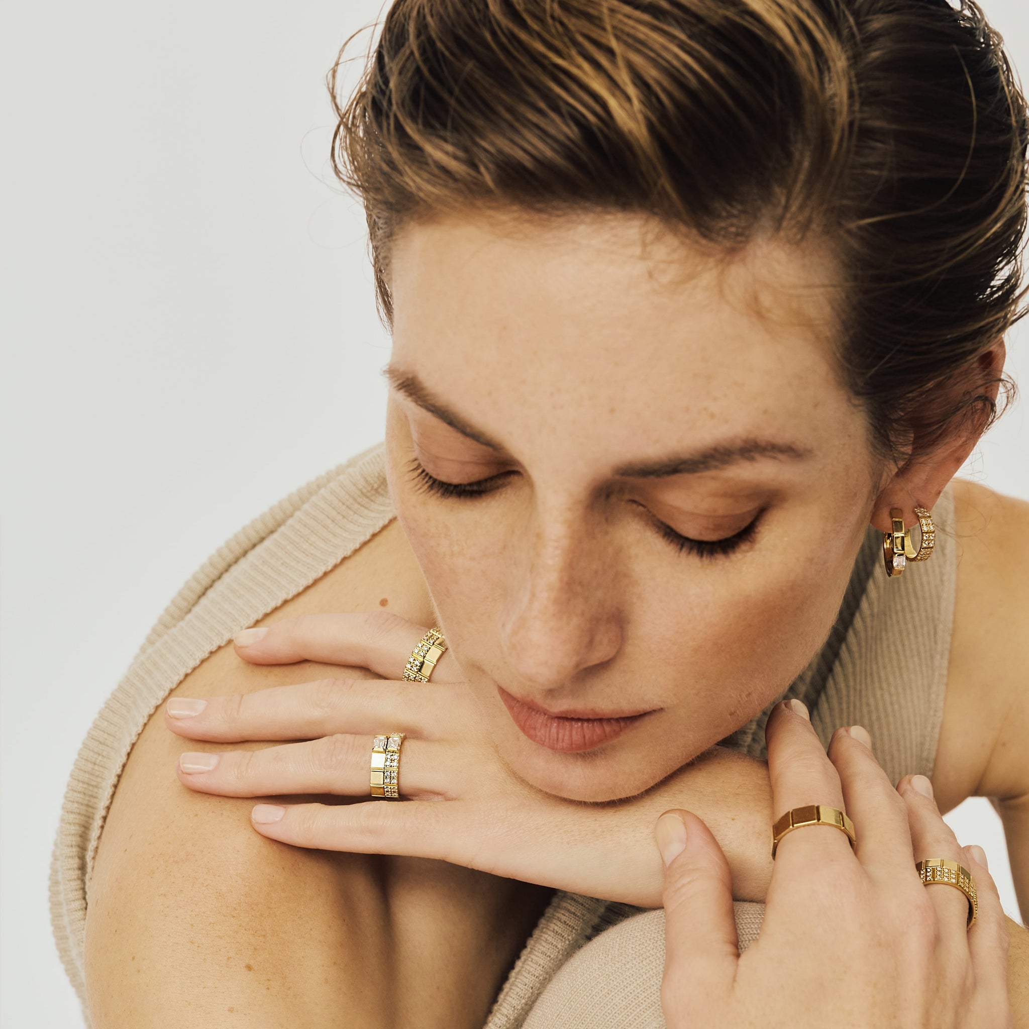 TILE RING FOUR EMERALD CUT DIAMOND